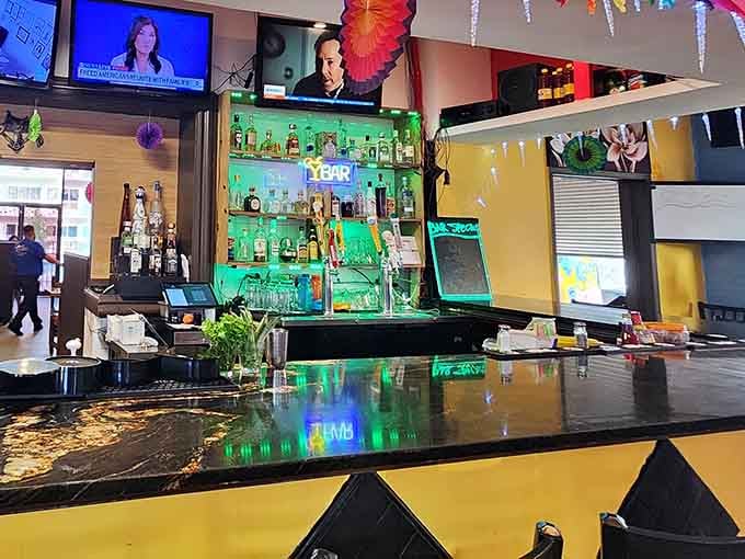That bar setup glows like a beacon of hope for anyone who's had a long day at work.