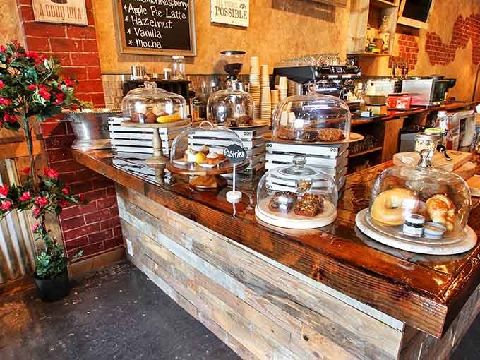 Glass domes protecting pastries like precious artifacts, which honestly isn't far from the truth when they're this good.