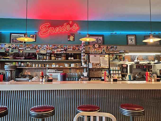 The iconic counter with its neon sign, where solo diners become part of the family.