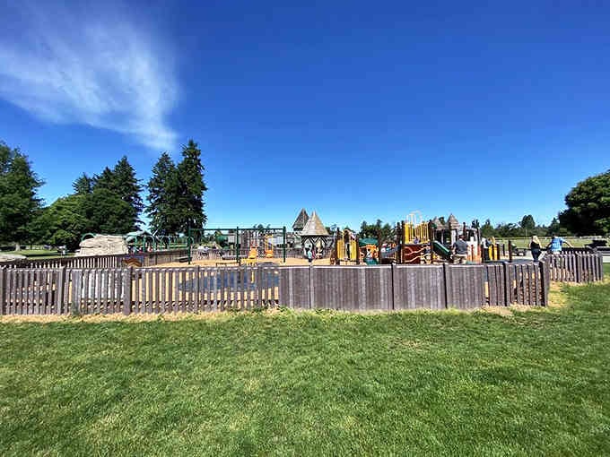 The fenced playground area means parents can actually sit down for thirty seconds without constant surveillance duty.