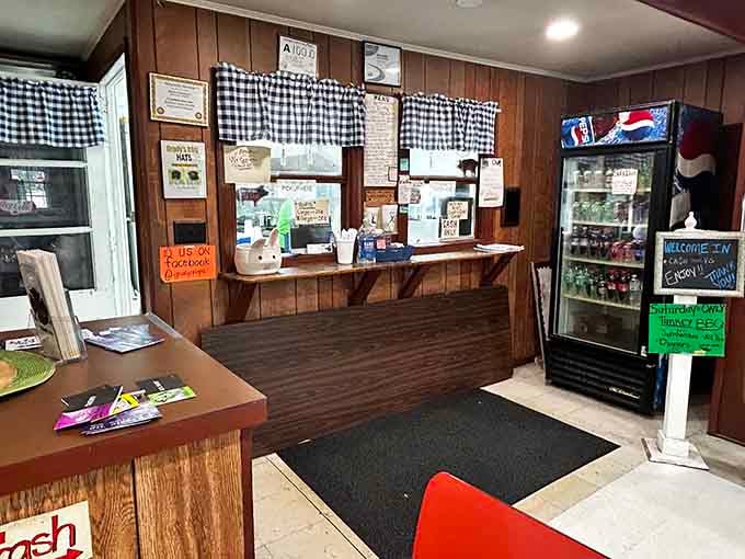 The order counter where barbecue dreams come true, one handwritten menu board and one hungry customer at a time.