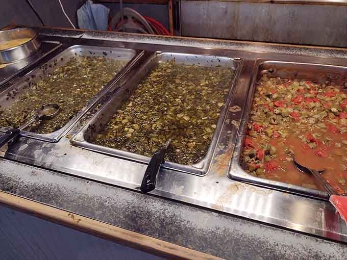 Steam trays full of greens and beans that have been slow-cooked into submission with proper Southern seasoning techniques.