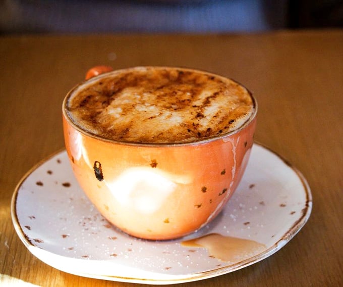 That cr&egrave;me br&ucirc;l&eacute;e latte served in a rose gold cup is basically liquid dessert pretending to be coffee.
