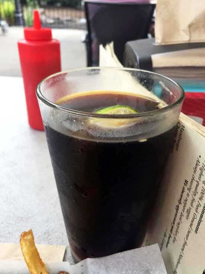 Dark beer with a wedge of lime, proving that sometimes the simple pleasures are the best.