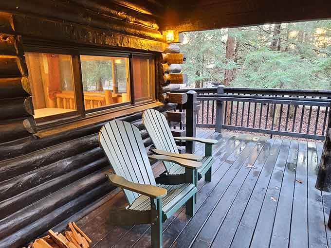 Cabin deck with Adirondack chairs facing the forest, your personal front-row seat to nature's show.