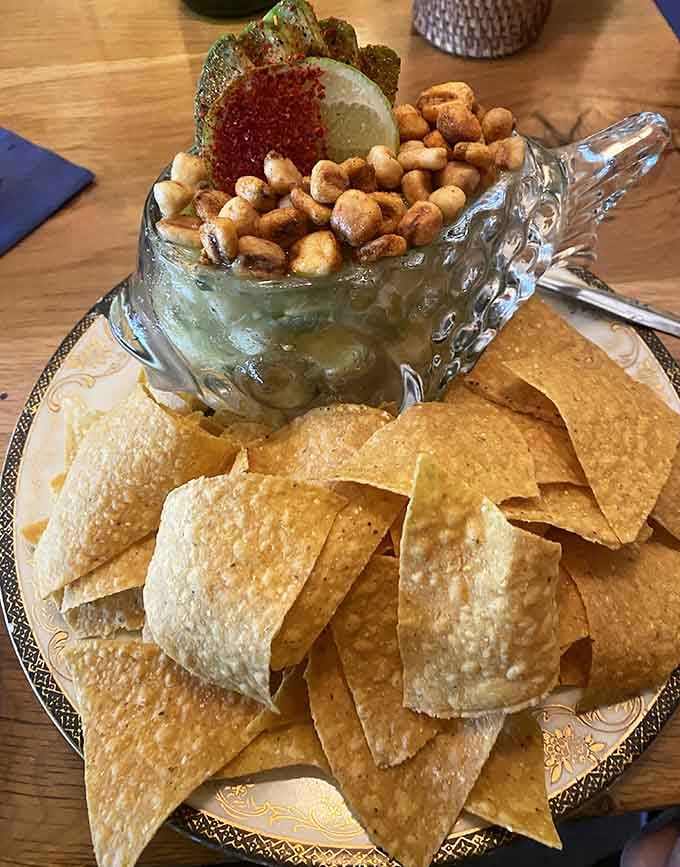 Vegan ceviche served in a fish-shaped dish, proving plant-based eating can be playful and delicious.