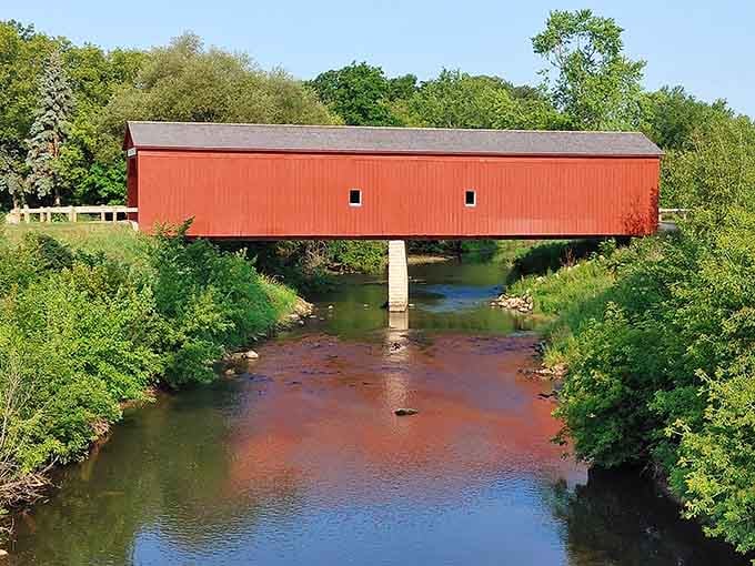 Spanning the creek with effortless grace, the bridge has been doing its job for over a century.