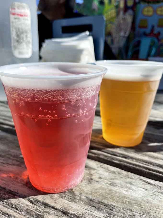 Cold beverages catching the sunlight, looking exactly like what thirsty beachgoers dream about all winter.