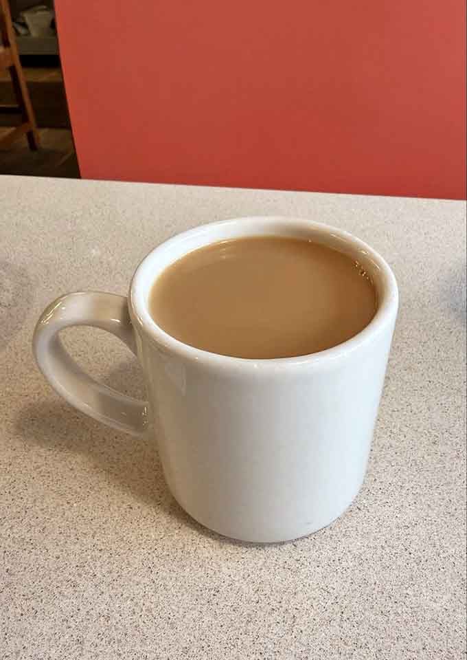 Hot coffee in a classic white mug, the kind that tastes better than fancy caf&eacute; versions somehow.