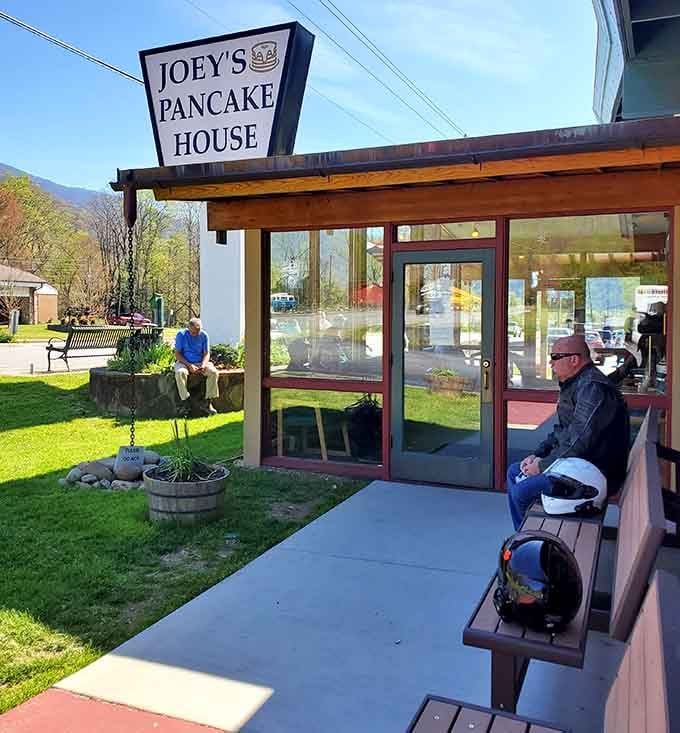 The entrance welcomes you like an old friend, complete with benches for the inevitable wait that's absolutely worth it.