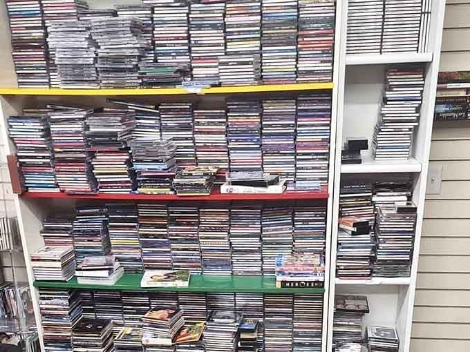 Hundreds of CDs stacked like the music collection you wish you'd kept from your younger, cooler days.