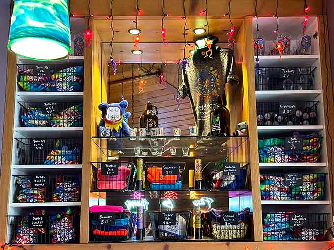 The merch display proves you can take the groovy vibes home, even if you can't take the pizza.