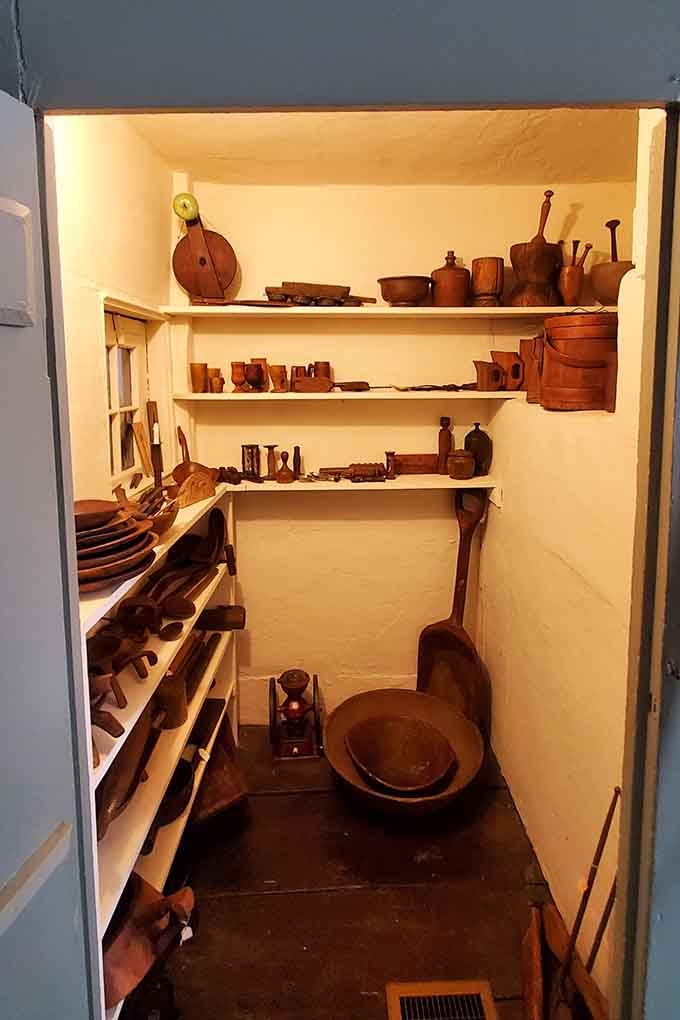 Before IKEA and Williams-Sonoma, colonial kitchens stored their wooden bowls and tools in cozy cupboards like this.