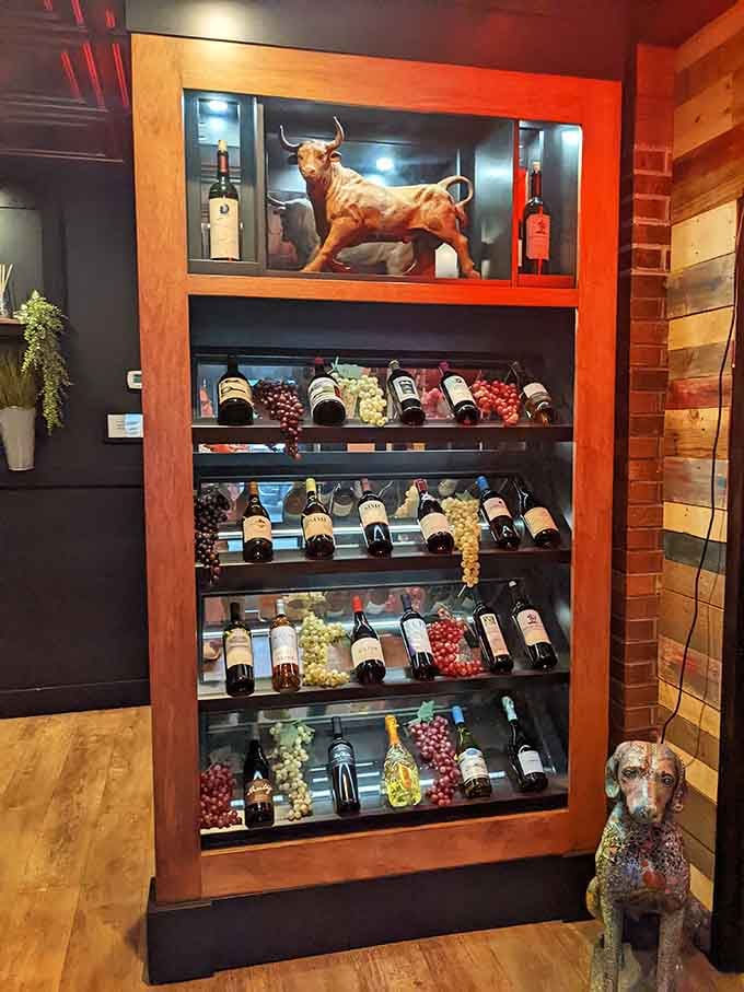 A wine display topped with a bull statue sends a clear message about what's on the menu.