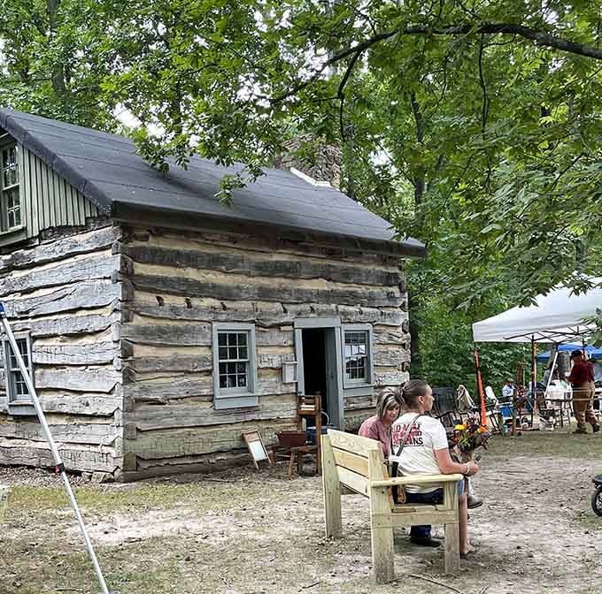 Young explorers peek into cabins where children their age once lived without video games or complaining about it.