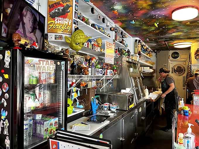 Behind the scenes, shelves packed with sci-fi collectibles prove this place takes its theme seriously and joyfully.