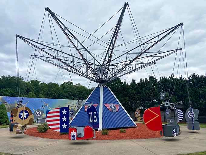 The Fly-O-Plane spins you around like a vintage aviation adventure designed by someone wonderfully unhinged.