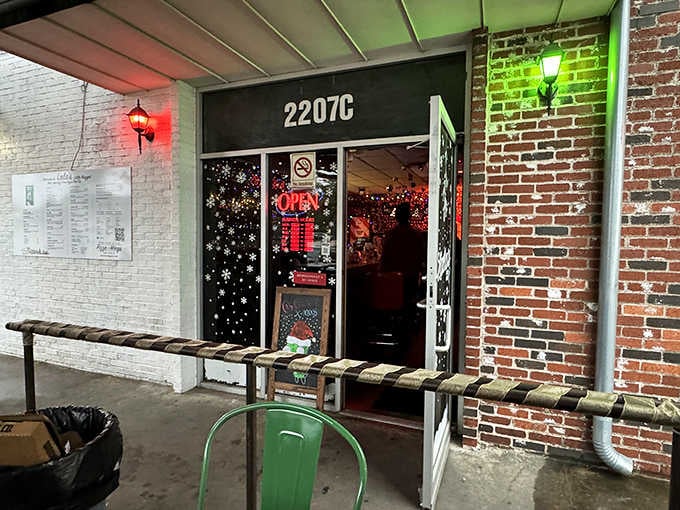 The unassuming entrance gives no hint of the spectacular holiday explosion waiting just beyond that door.