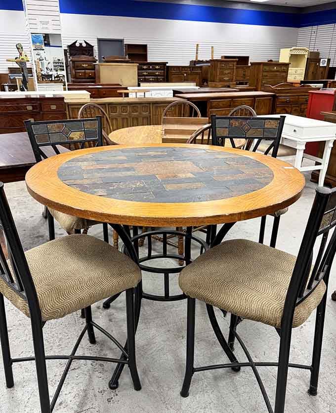 This dining set with its unique inlaid top could host your next dinner party in serious style.