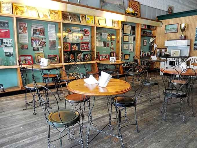 Round tables and vintage memorabilia create a dining room that feels like your coolest grandparent's rec room, only better.