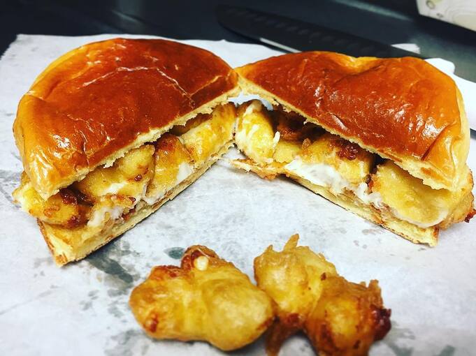 That grilled cheese curd sandwich oozing melted goodness with tater tots is basically comfort food royalty in portable form.