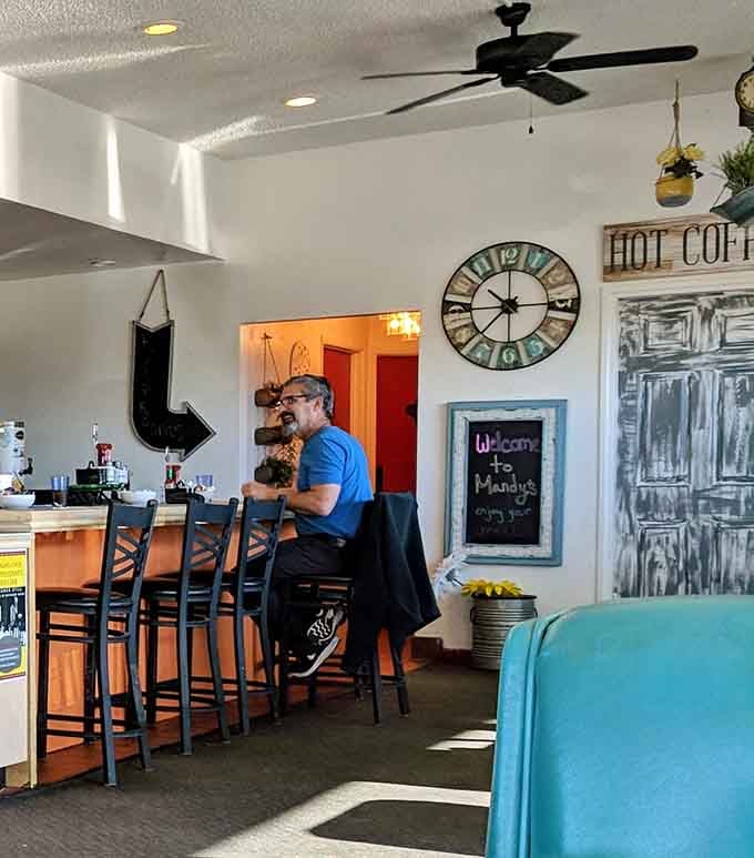 Counter seating with a view of the action, where coffee flows freely and conversations happen naturally with strangers.