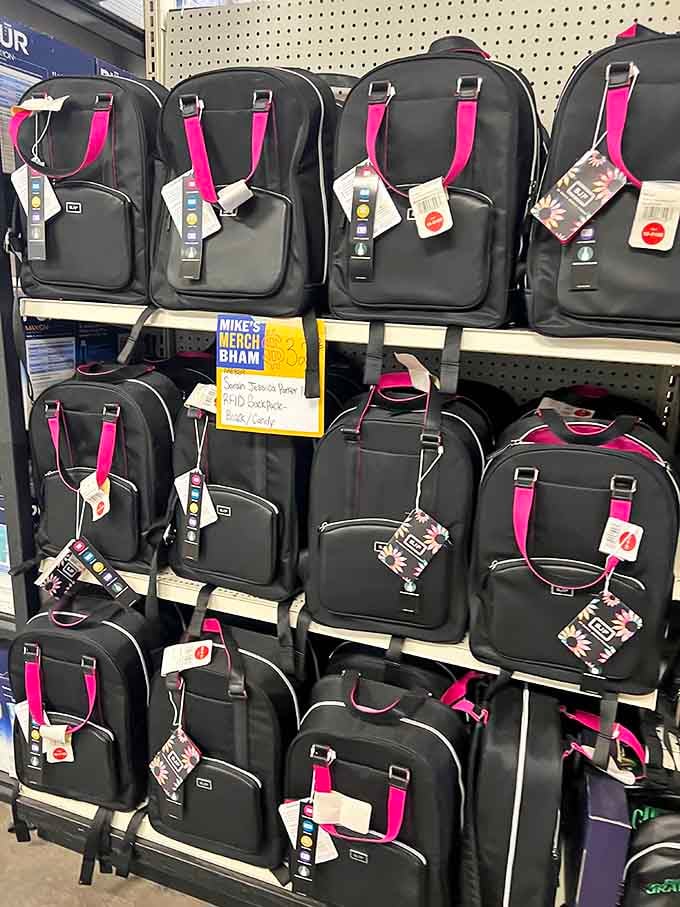 Backpacks with pink accents lined up like soldiers, ready to carry books, laptops, or whatever life throws your way.