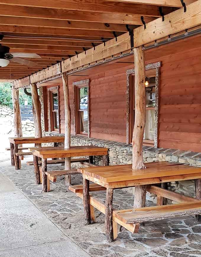 Outdoor seating with handcrafted log furniture lets you enjoy mountain air with your mountain-sized portions of food.