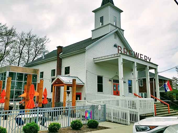 A converted church now serving craft beer instead of sermons, proving redemption comes in many delicious forms.