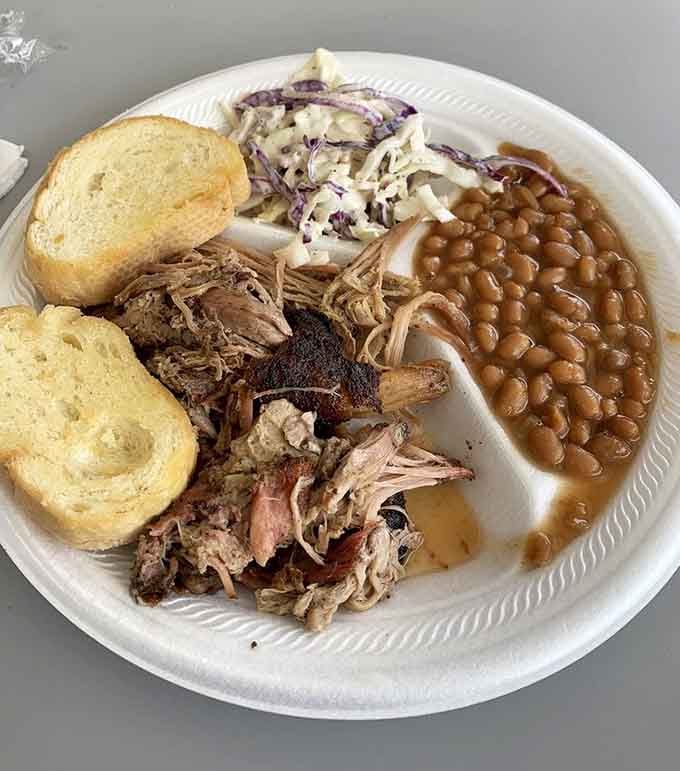 Pulled pork with beans and slaw delivers comfort food that'll have you planning your next visit before finishing.