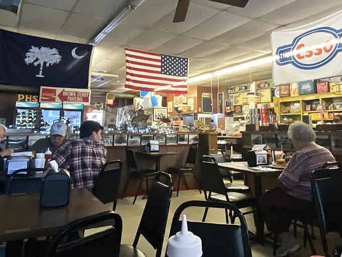 The American flag hangs proudly while customers dig into classic American fare, creating the most patriotic lunch experience possible.