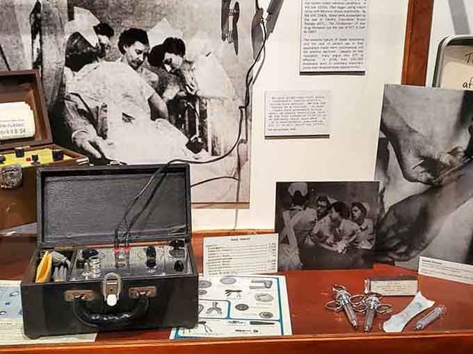 Electroshock therapy equipment sits alongside photographs showing treatments we're grateful to have left behind completely.