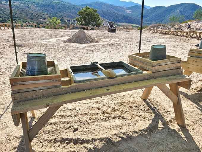 Traditional sluice boxes and buckets represent mining methods that haven't changed much since the Gold Rush days.