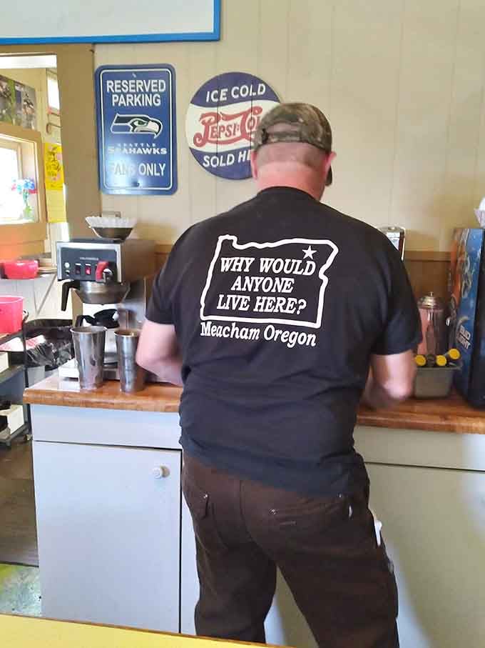 The staff's shirt says it all: "Why would anyone live here?" Because places like this exist.