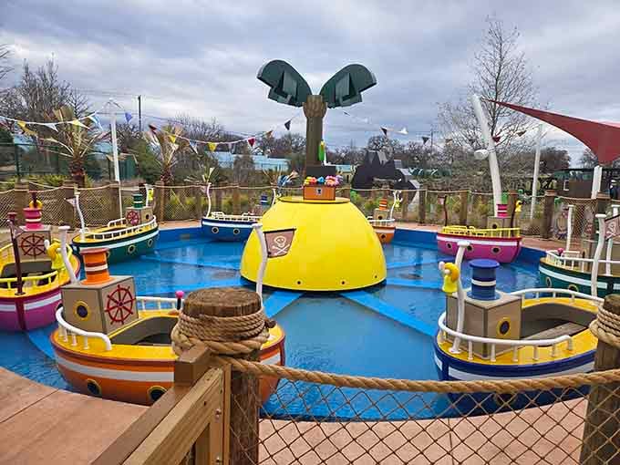 Pirate boats ready to rock and roll, minus the actual ocean but with all the swashbuckling spirit.