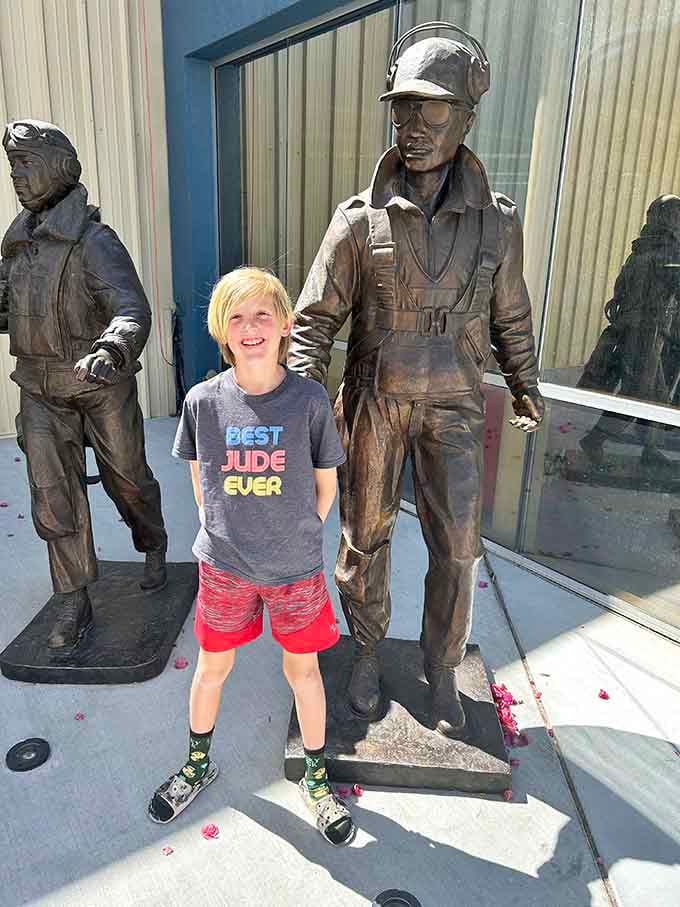 These bronze airmen stand eternal watch, reminding visitors of the real people behind these magnificent machines.