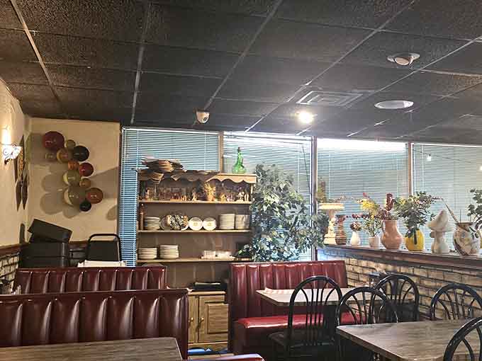 Classic red booths and decorative plates create that timeless Italian-American restaurant vibe your grandparents would recognize and approve of.