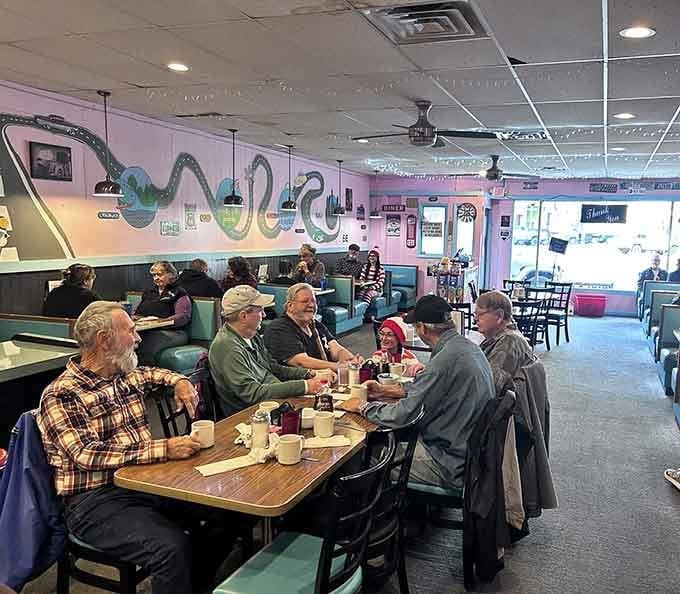 Real people enjoying real food in real booths, exactly what a proper diner experience should look like always.
