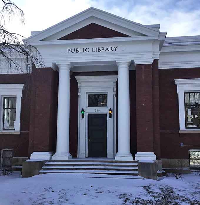The Public Library's columned entrance practically begs you to come inside and remember what books feel like in your hands.