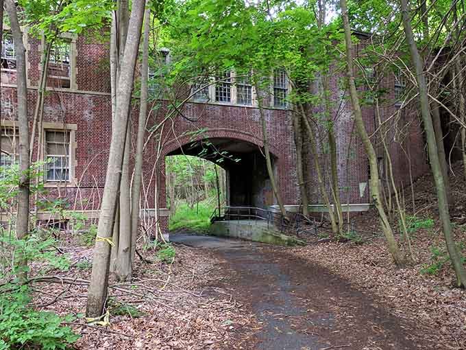 These brick archways connected buildings and lives, now serving as atmospheric passages for haunted attraction visitors.