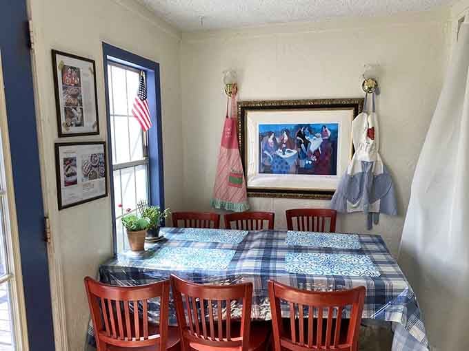 Cozy dining nook with blue gingham tablecloths where pie tastes even better than it looks.
