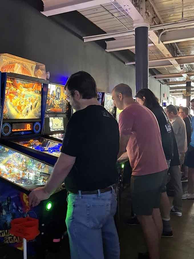 Pinball enthusiasts gathered around their favorite machines, proving that some competitions never need an internet connection to thrive.