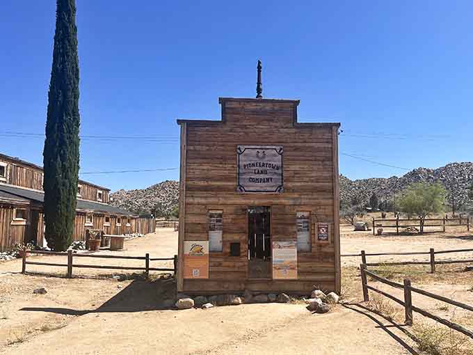This narrow building's simple facade hides the fascinating history of the land company that built this entire movie-set town.