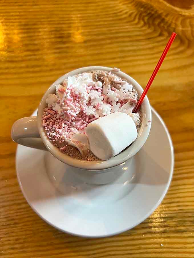 Hot chocolate piled so high with toppings, it's basically dessert pretending to be a beverage, and we're not complaining.