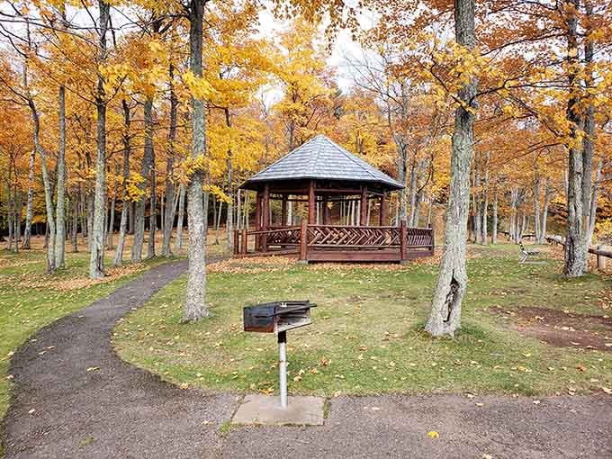 The gazebo sits ready for everything from quiet contemplation to family gatherings with Michigan's finest natural backdrop.