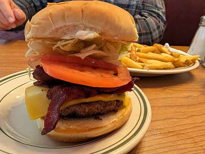 A burger so beautifully constructed it deserves a moment of silence before that glorious first bite happens.