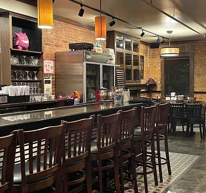 Counter seating with a bar vibe lets you watch the magic happen while anticipating your steaming bowl.