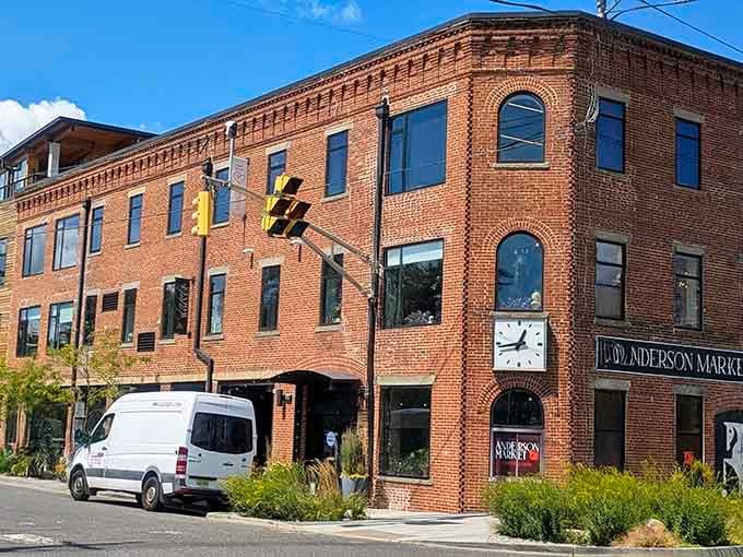 Exposed brick and oversized windows create that industrial-chic vibe everyone's been trying to replicate since the '90s.