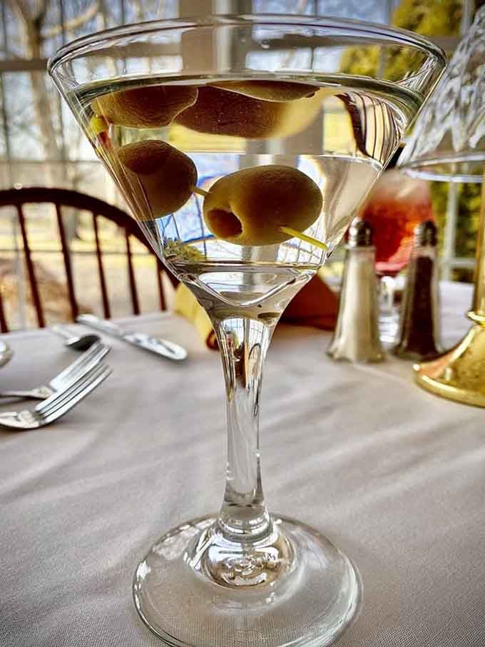 Three olives mean three times the sophistication in this crystal-clear martini of your dreams.