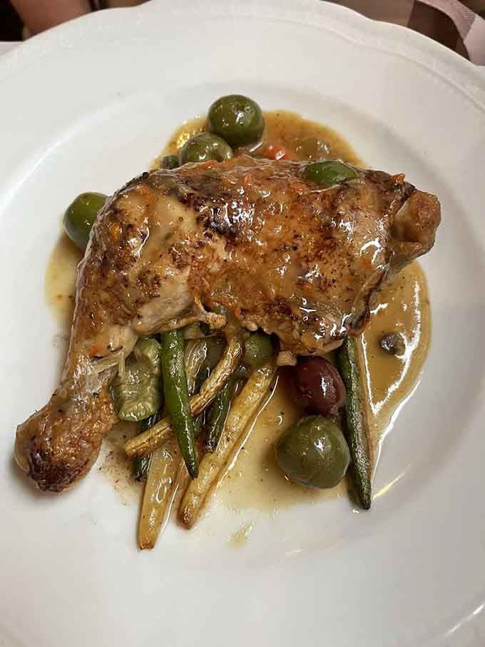 Roasted chicken with olives and green beans, comfort food that somehow manages to feel elegant at the same time.